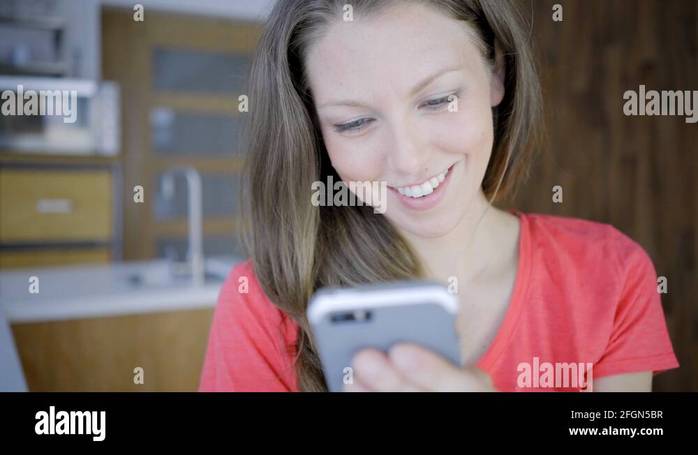 Woman in her 30s inside a modern condominium in downtown toronto ...