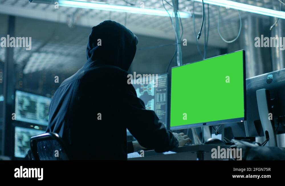 Team of Internationally Wanted Teenage Hackers with Green Screen Mock ...