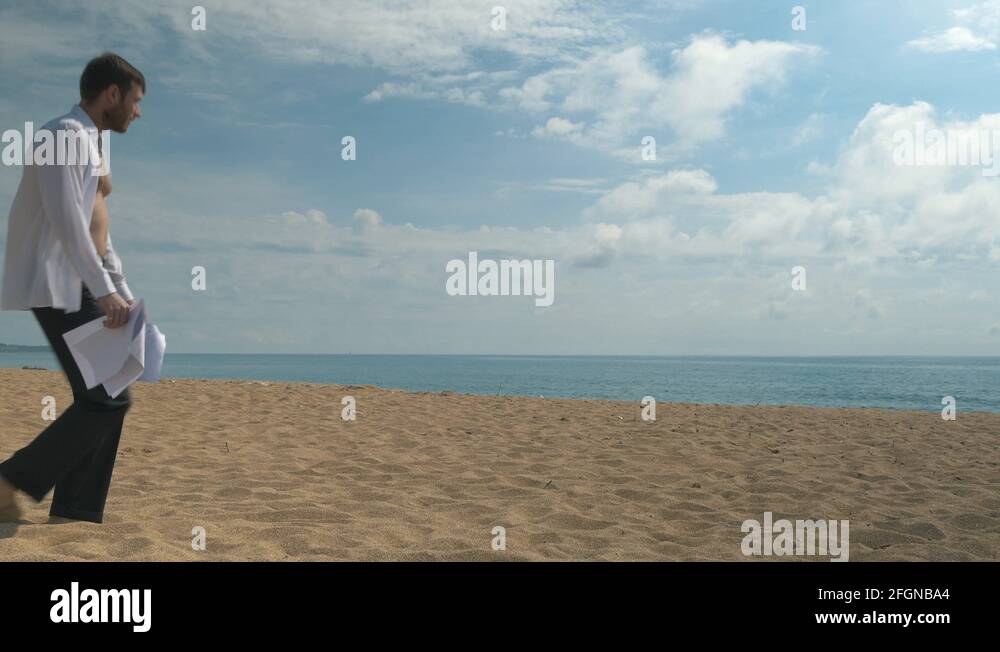 Worker on beach Stock Videos & Footage - HD and 4K Video Clips - Alamy