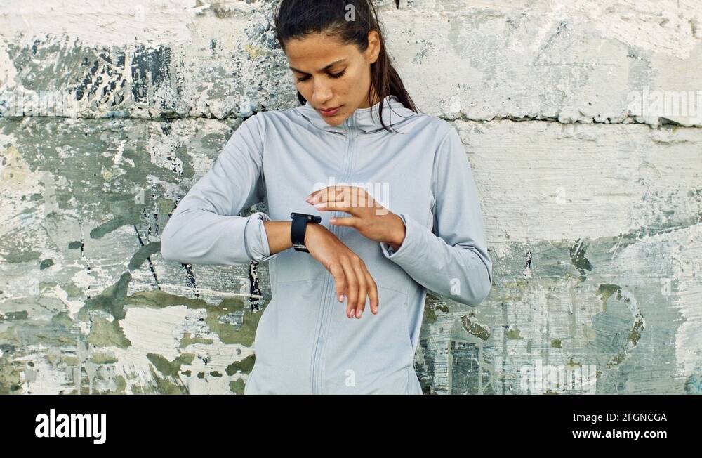 Woman fit looking at watch Stock Videos & Footage - HD and 4K Video ...