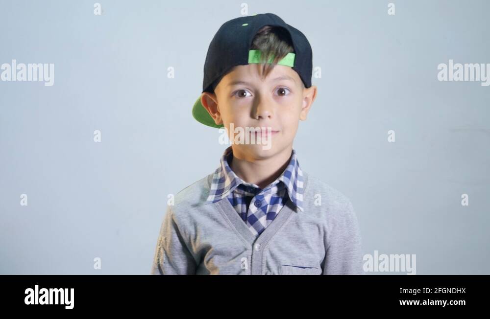 Boy with a cap Stock Videos & Footage - HD and 4K Video Clips - Alamy