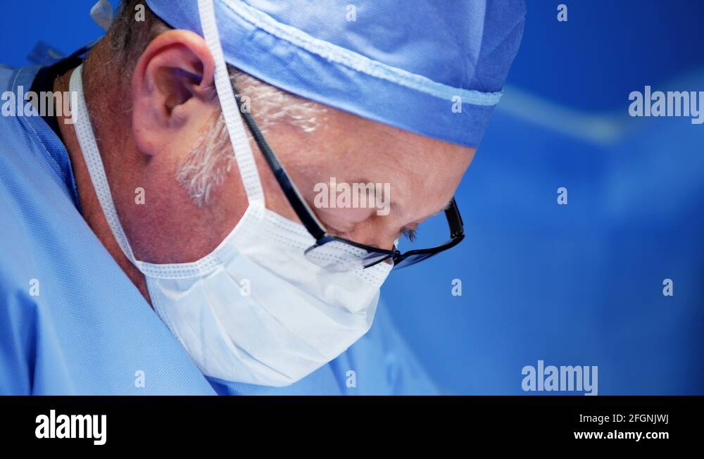 Surgical team in an operating theatre Stock Videos & Footage - HD and ...