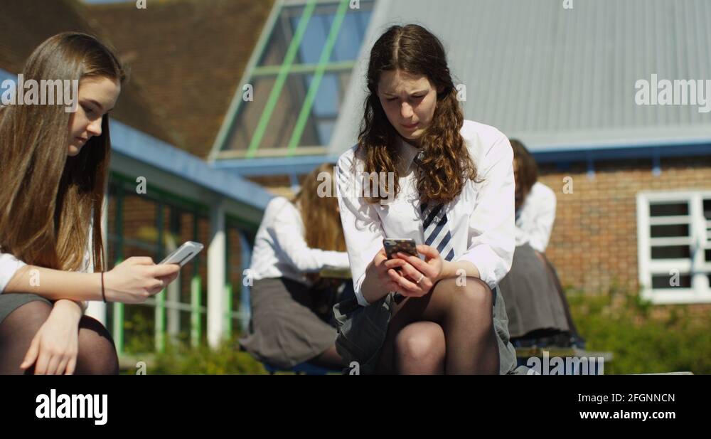 Teenagers outside school building uniform Stock Videos & Footage - HD ...