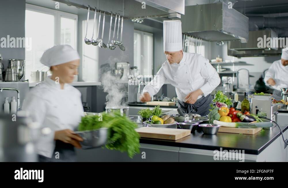 Famous Chef Works in a Big Restaurant Kitchen with His Apprentices ...