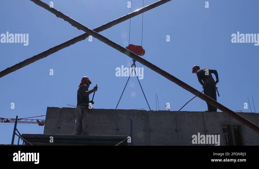 Crane moving concrete Stock Video Footage - Alamy