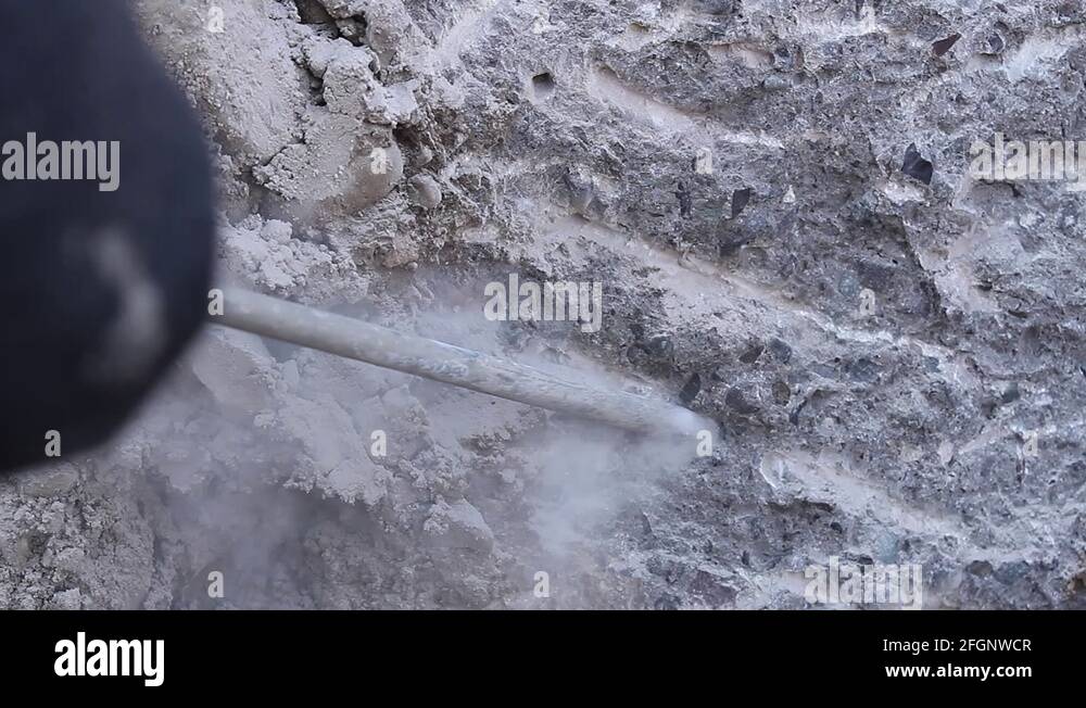 Drilling stone Stock Videos & Footage - HD and 4K Video Clips - Alamy