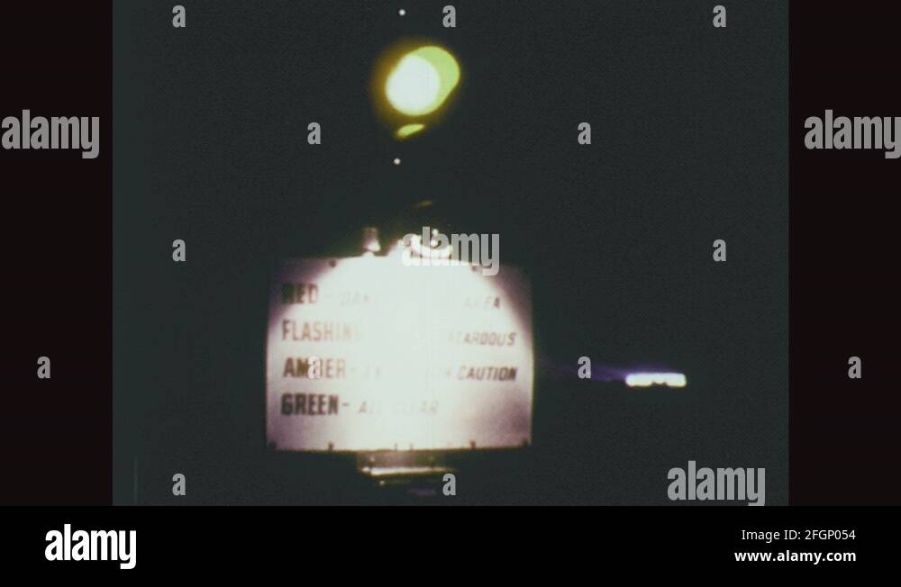 1960s: Signal light and sign. Launch base and moon. Moon through window ...