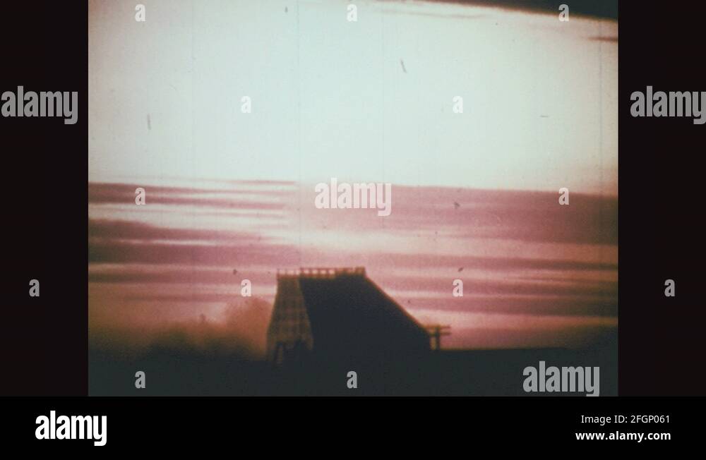 1950s: Rocket shoots into sky. Rocket explodes and launches, flaming ...