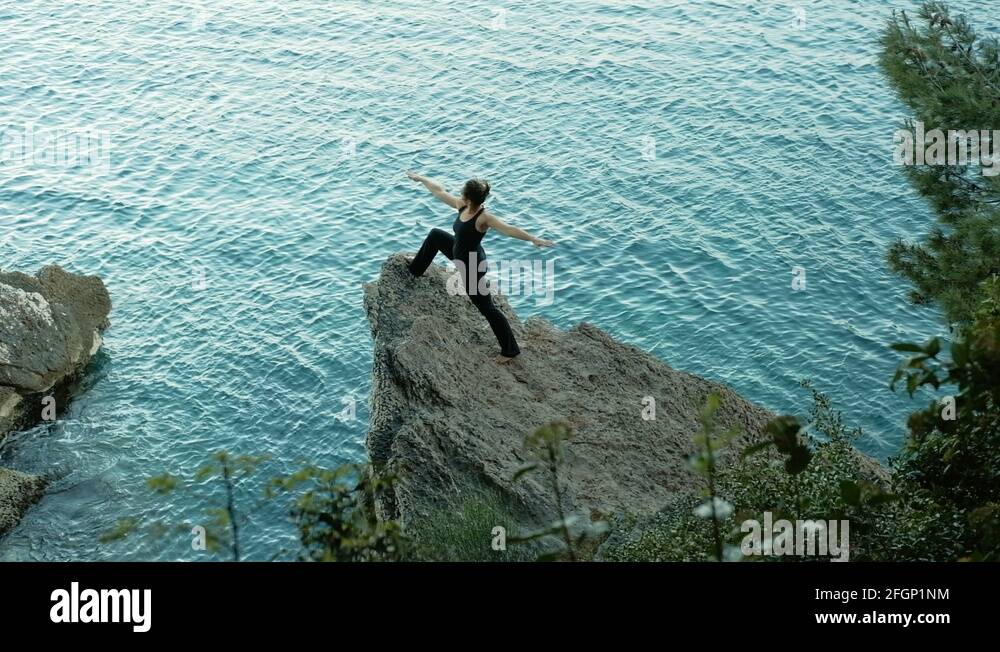 Knee to chest pose Stock Videos & Footage - HD and 4K Video Clips - Alamy