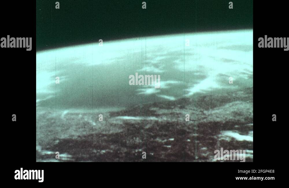 1960s: View of earth from space. Map of earth on with arrow tracking ...
