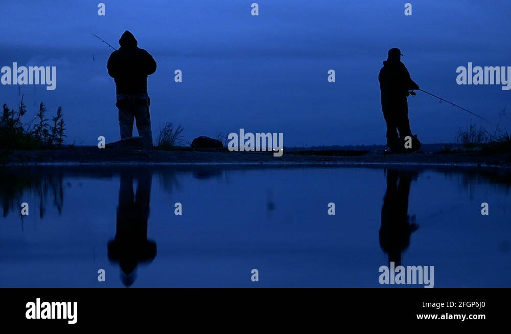 Fisherman Fishing At Night Stock Video Footage - Alamy