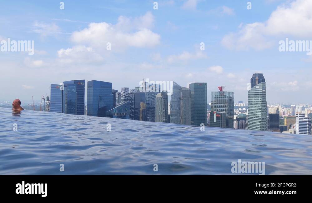 summer day singapore famous hotel rooftop crowded pool water panorama ...