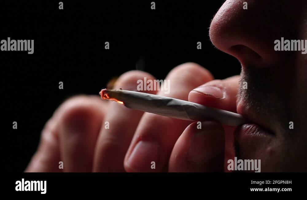 Lighting a joint Stock Videos & Footage - HD and 4K Video Clips - Alamy