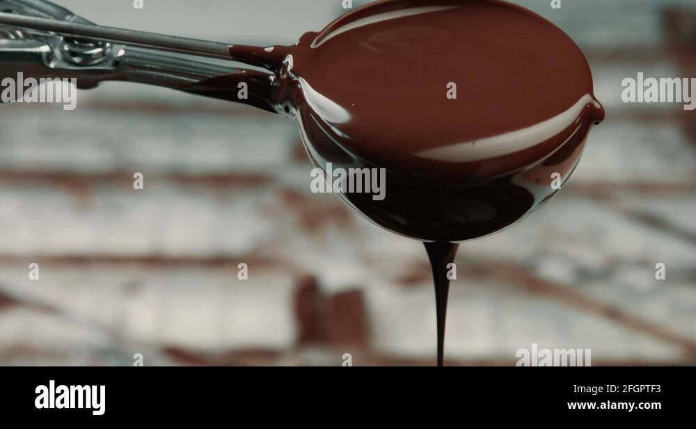 liquid chocolate texture. Process of making a chocolate bars Stock ...