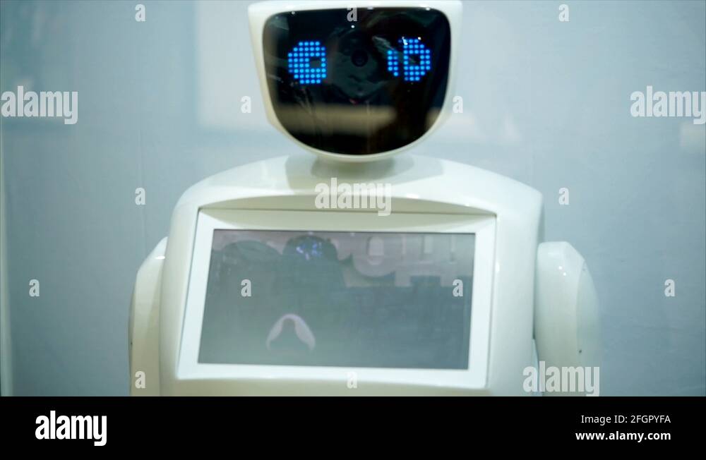 Antropomorf robot with screen. Robot guide. Robot TV. Big white robot ...