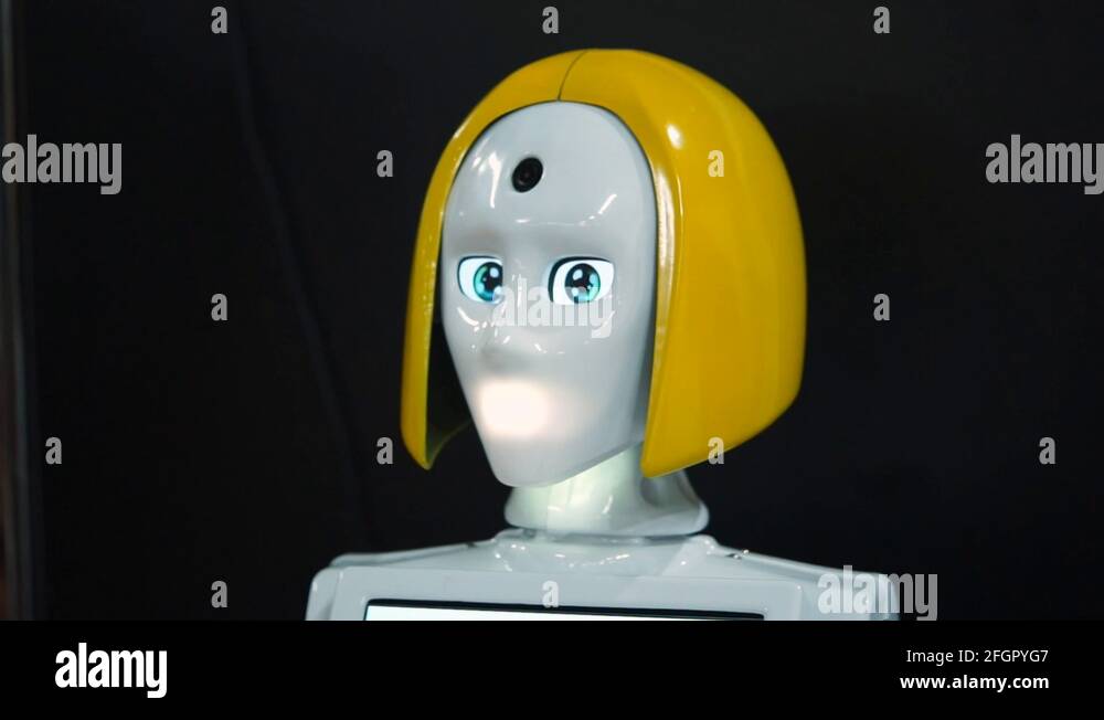 Robot girl with realistic head and face. Camera in the forehead and ...
