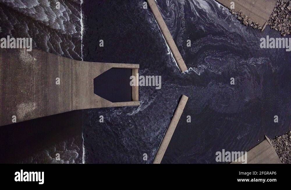 Dam construction architecture monument top view with flowing water from ...