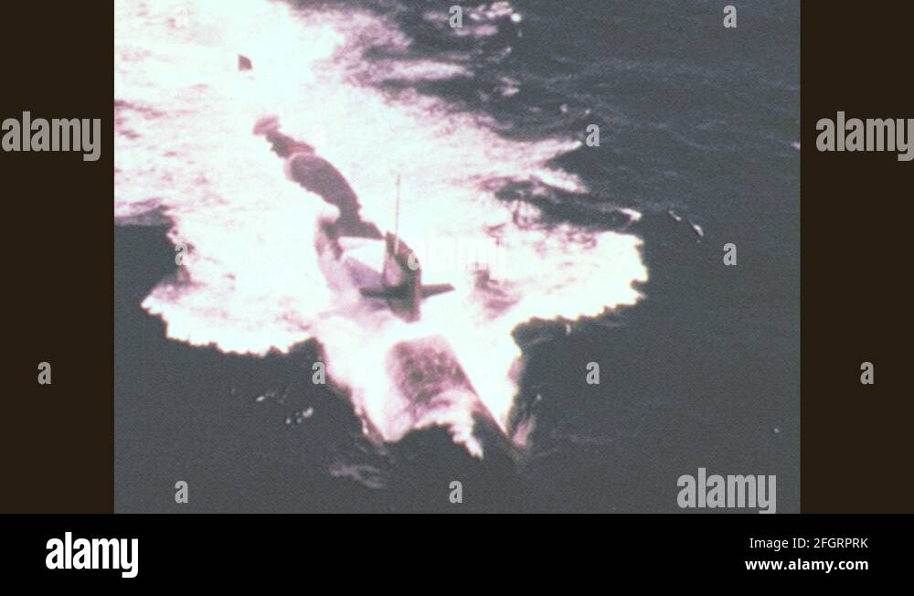 1970s: UNITED STATES: USS Whale (SSN-638) submarine travels along ...