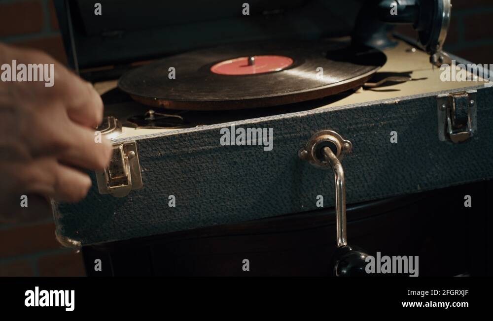 man from the 1920s winding a vintage phonograph 4k Stock Video Footage ...