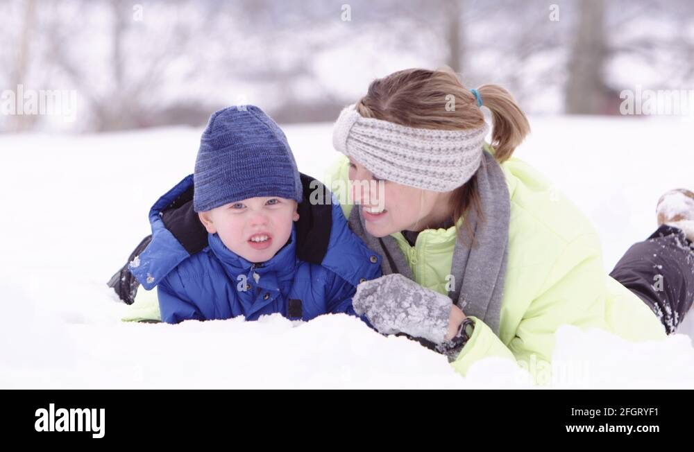 Mother and son in the snow Stock Videos & Footage - HD and 4K Video ...
