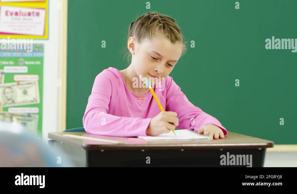 Girl writing in classroom Stock Videos & Footage - HD and 4K Video ...