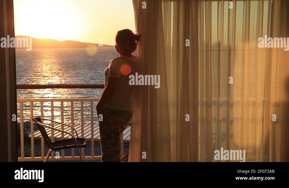 Woman watching from balcony Stock Videos & Footage - HD and 4K Video ...