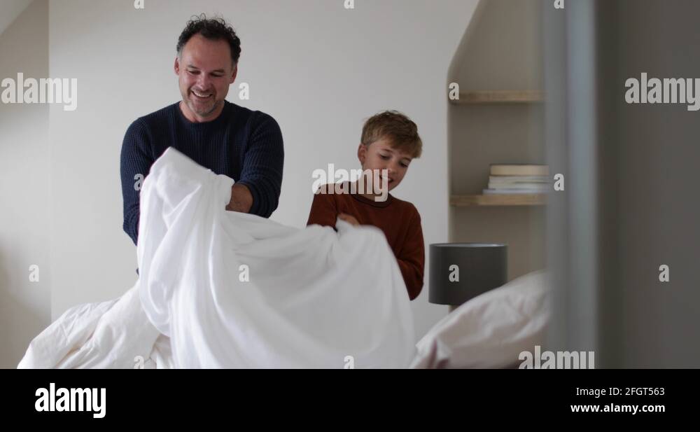 Kid making bed chore Stock Videos & Footage - HD and 4K Video Clips - Alamy