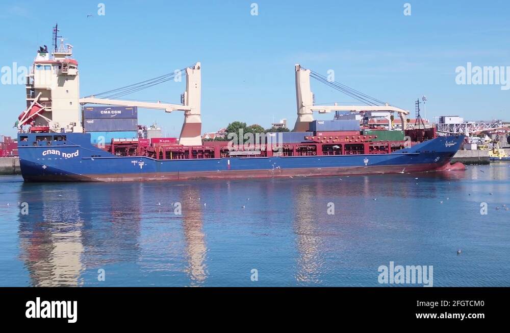 container ship entering harbor slow motion 4k Stock Video Footage - Alamy