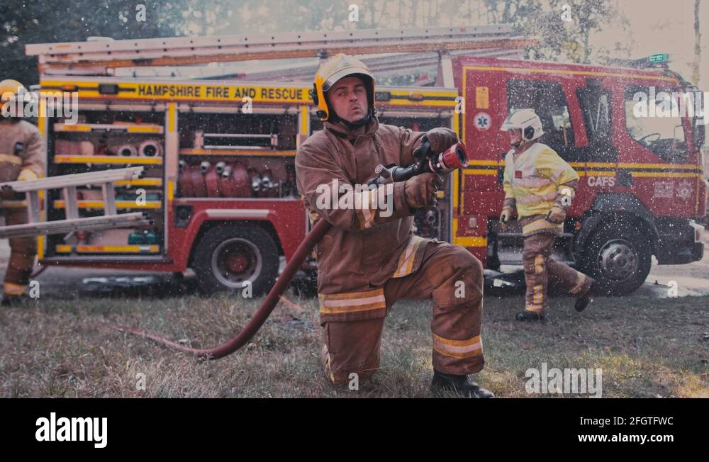 Fireman helmet uk Stock Videos & Footage - HD and 4K Video Clips - Alamy