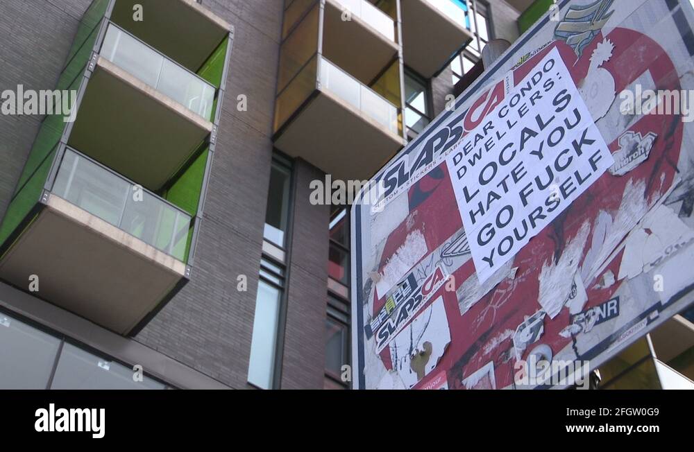 Anti gentrification protest signs in downtown urban Toronto Stock Video ...