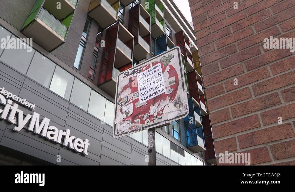 Anti gentrification protest signs in downtown urban Toronto Stock Video ...