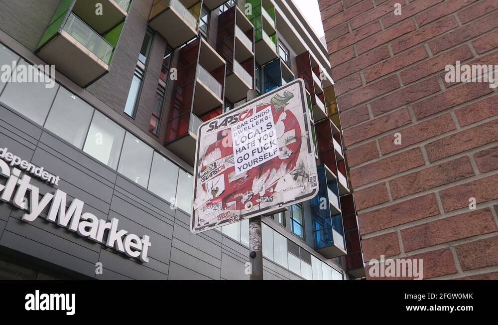 Anti gentrification protest signs in downtown urban Toronto Stock Video ...