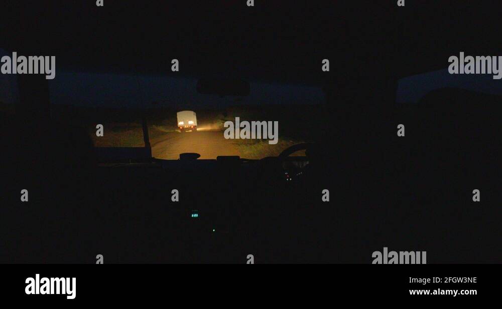 Night time in a tourist land cruiser safari through Maasai Mara ...