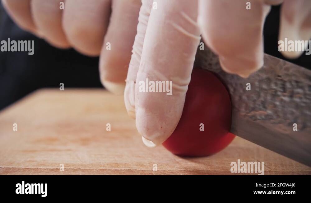 Slice tomatoes in half chef Stock Videos & Footage - HD and 4K Video ...