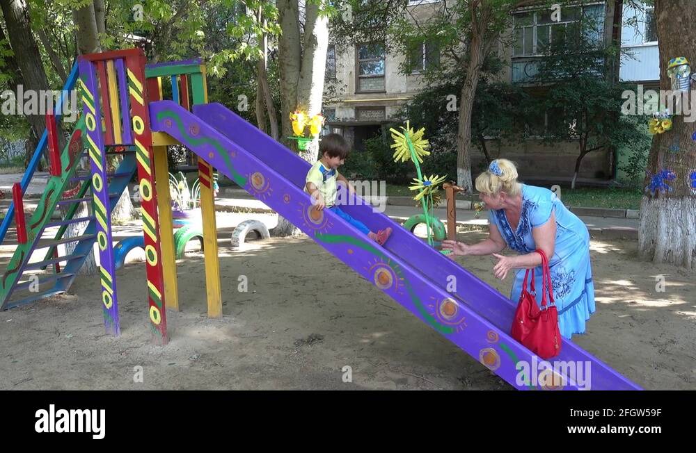 Woman going down slide Stock Videos & Footage - HD and 4K Video Clips ...