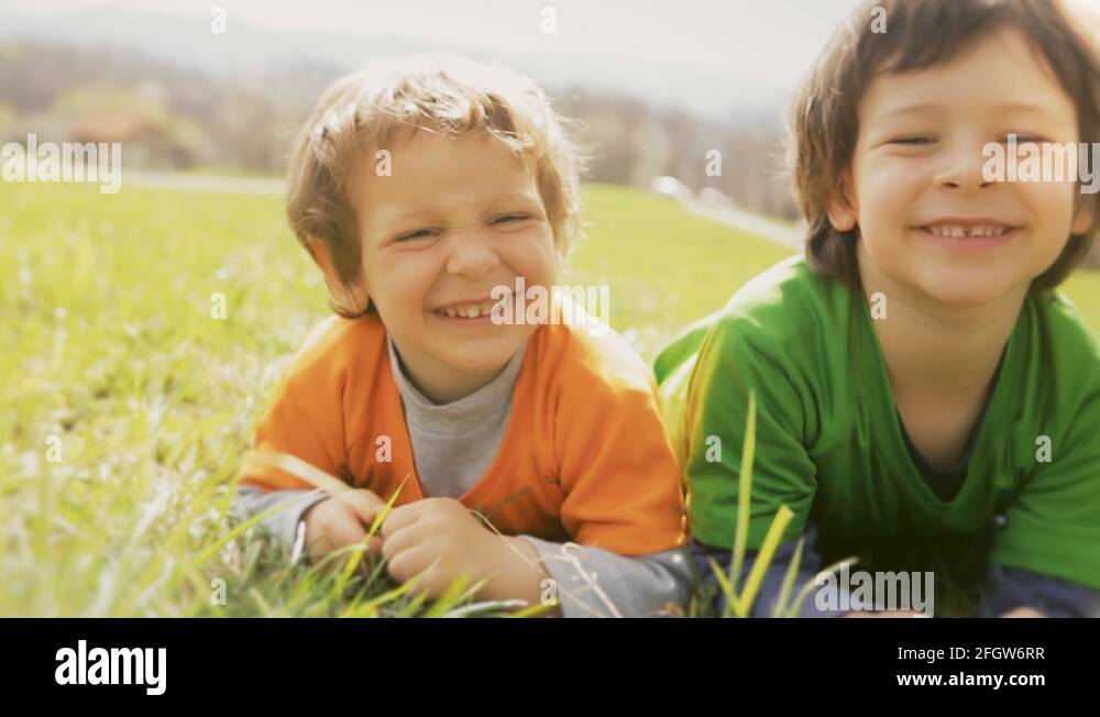 Grass happy kids laughing outdoors smile Stock Videos & Footage - HD ...