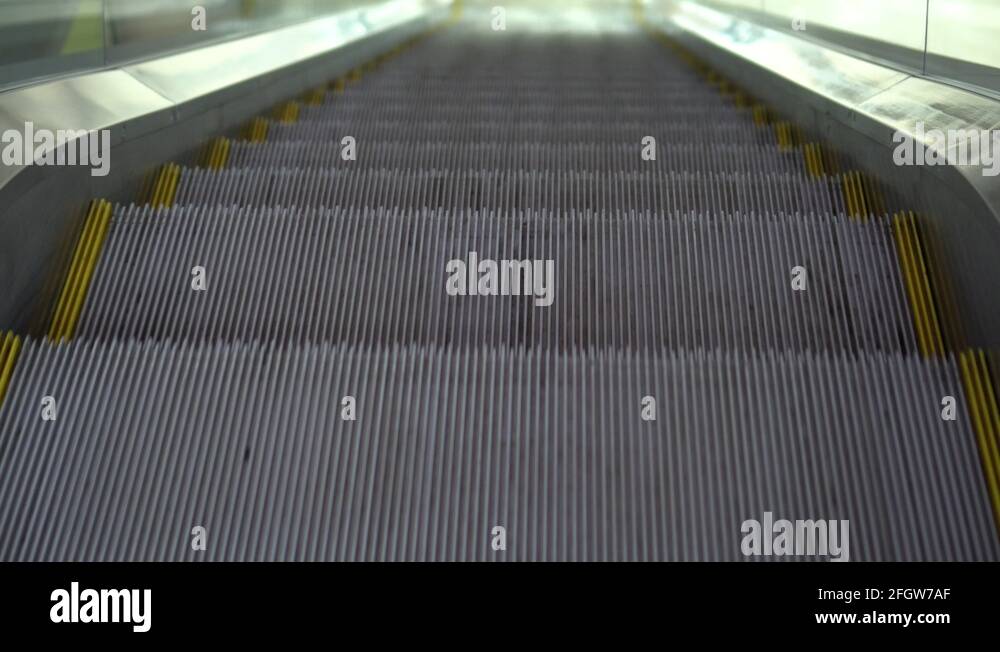 Escalator close up. Escalator steps. Moving steps of the escalator ...
