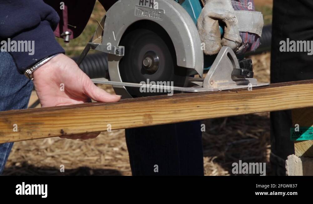 Female Construction Worker Using Circular Saw Stock Video Footage - Alamy