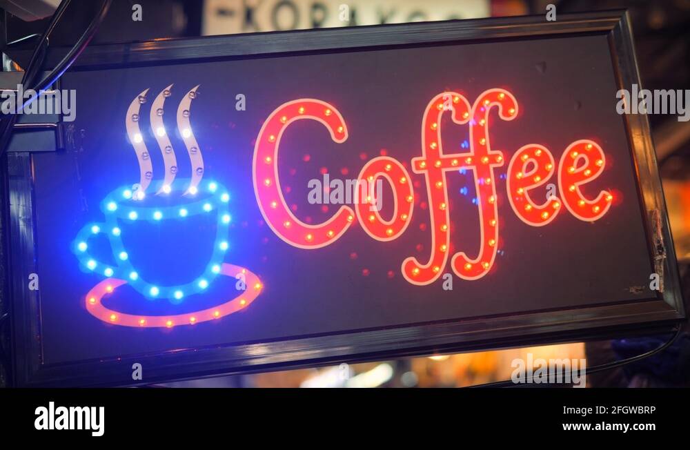 Blinking Led Coffee Shop Street Sign with Beautiful Unfocused Bokeh ...