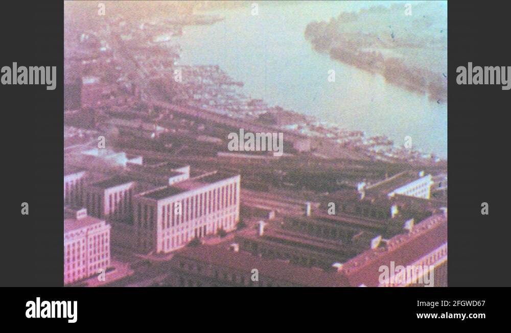 1950s: Aerial view of downtown city on river. Map of Mid Atlantic ...