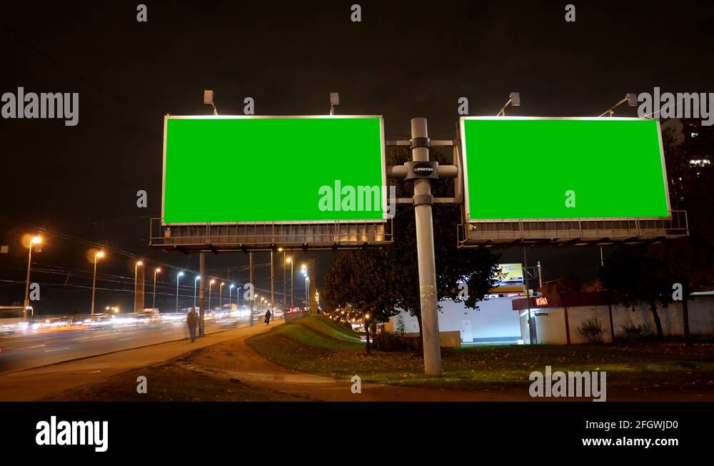 Time Lapse. A Billboard with a Green Screen on a Busy Street Stock ...