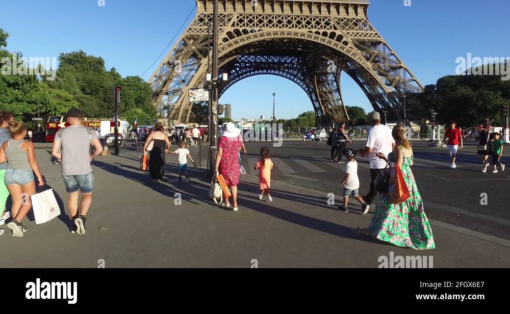 Eiffel Tower Paris, France from Iena Bridge (Pont d'Iena) with tourists ...