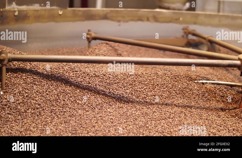 process of mixing and roasting coffee beans production slow motion 4k ...
