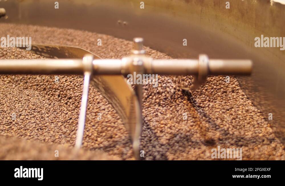 process of mixing and roasting coffee beans production slow motion 4k ...