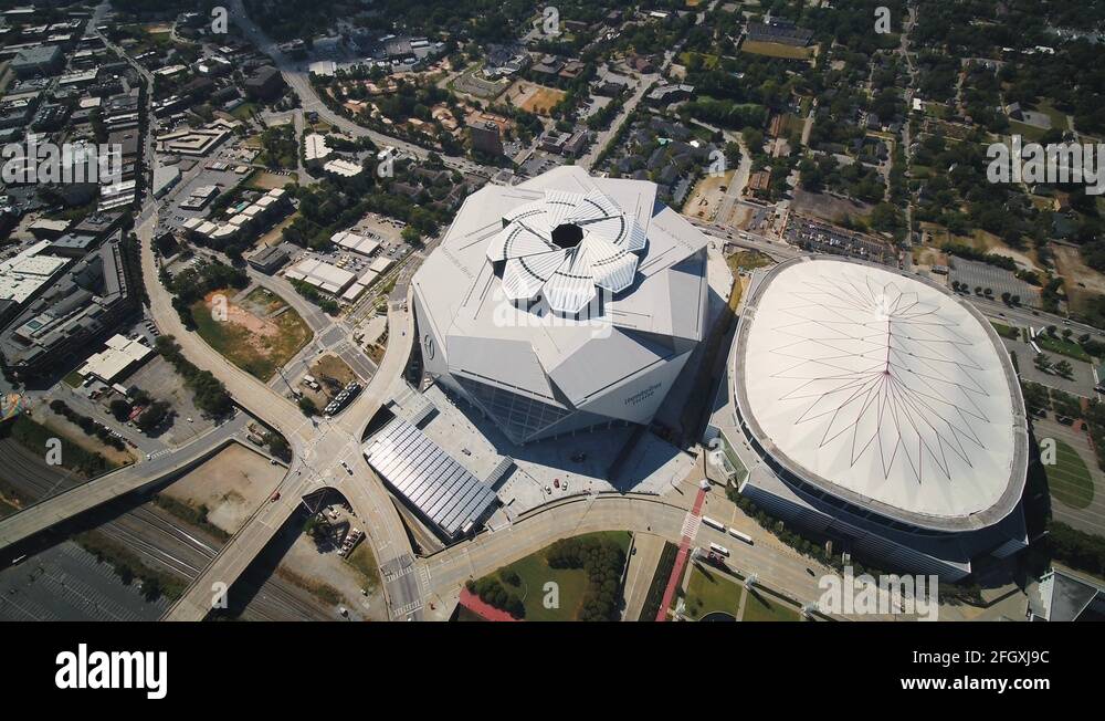 Atlanta Aerial v353 Flying over two football stadiums panning down ...