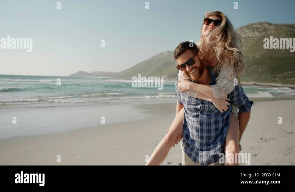 Piggy back ride beach Stock Videos & Footage - HD and 4K Video Clips ...