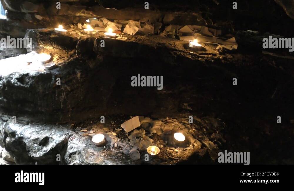 People light candles and leave notes with prayers in Rabbi Rashbi cave ...