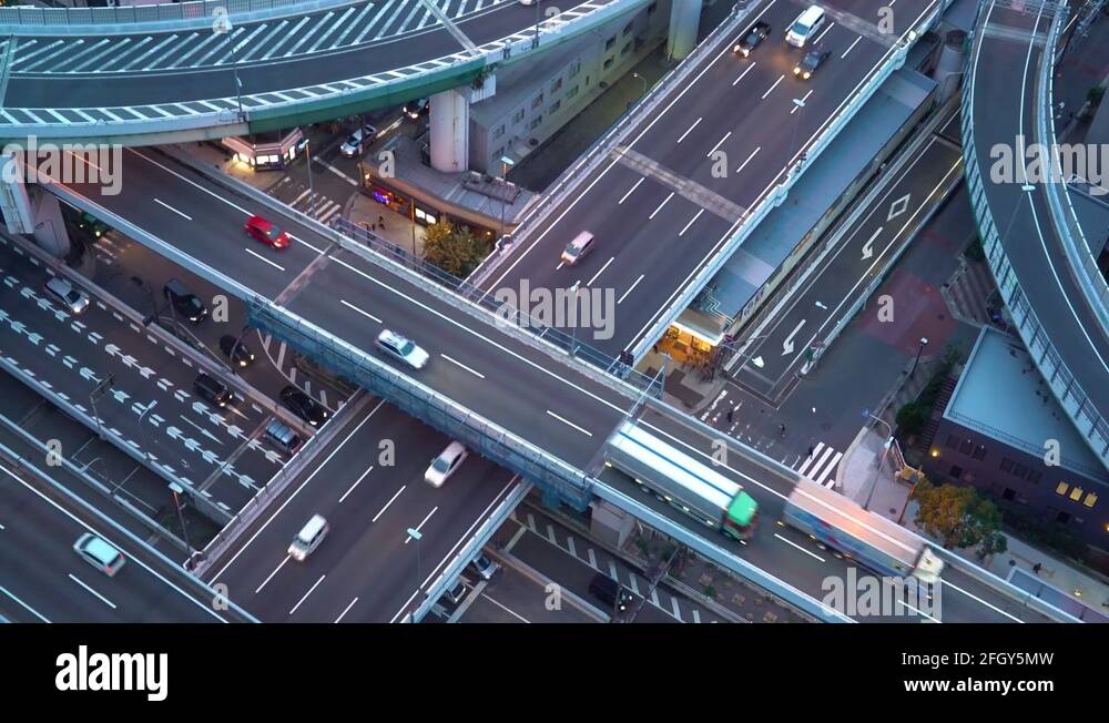 Big highway intersection in Osaka at twilight Stock Video Footage - Alamy