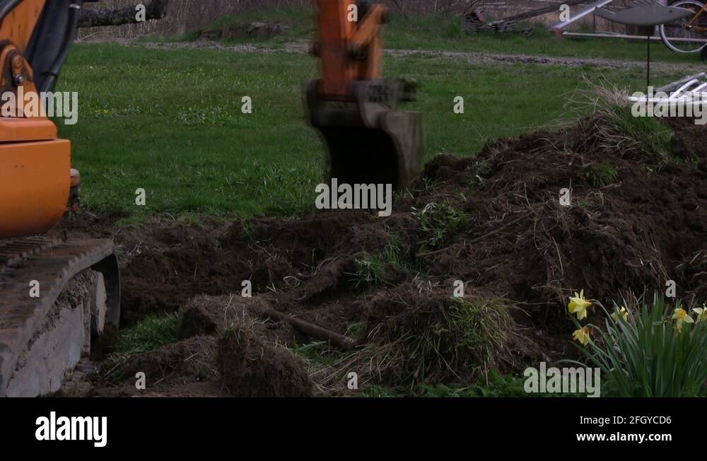 Backhoe excavate lift dig Stock Videos & Footage - HD and 4K Video ...