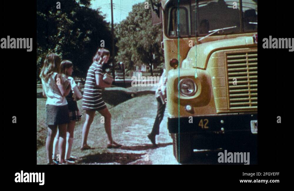 1970s: Students board school bus Stock Video Footage - Alamy